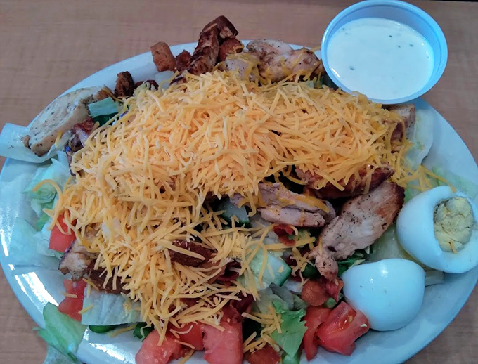 A salad so loaded with toppings you'll need architectural support, proving healthy can also mean satisfying.