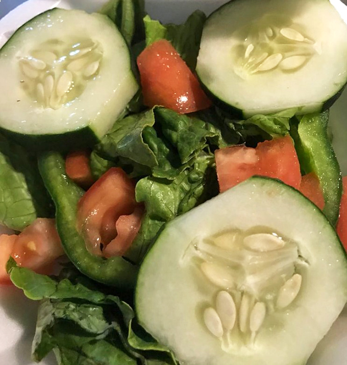A garden party in a bowl &ndash; crisp cucumbers, juicy tomatoes, and fresh greens that actually make you excited about eating vegetables.