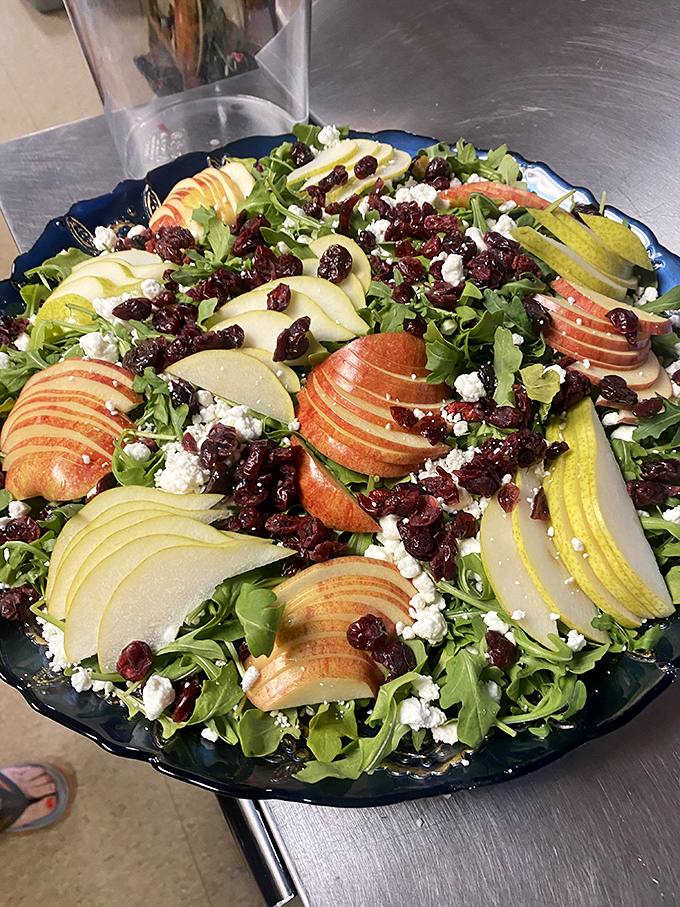Even the salad at a barbecue joint looks like it's having more fun than salads elsewhere, with apples and cranberries bringing the party.