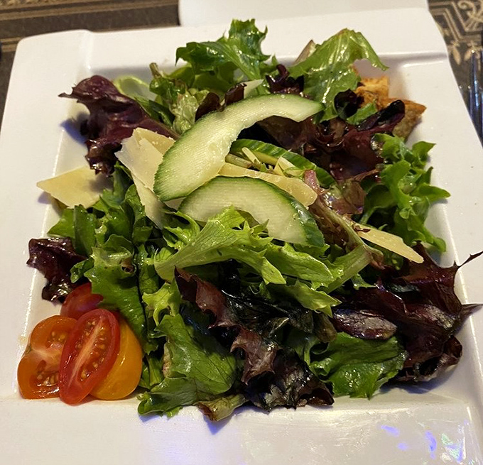 A salad that actually deserves respect&mdash;crisp greens, cucumber ribbons, and tomatoes that didn't grow up in some sad refrigerated truck.