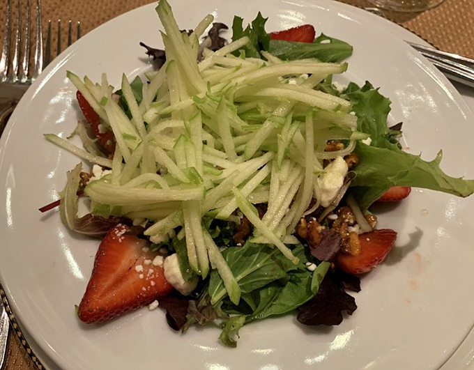 A salad that proves green things can be exciting&mdash;where strawberries and crisp apple strands transform ordinary lettuce into something worth talking about.