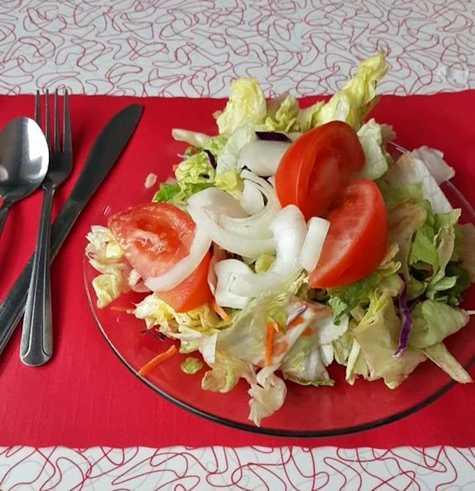 A fresh garden salad that actually looks like it came from a garden&mdash;crisp, colorful, and the perfect counterbalance to diner indulgences.
