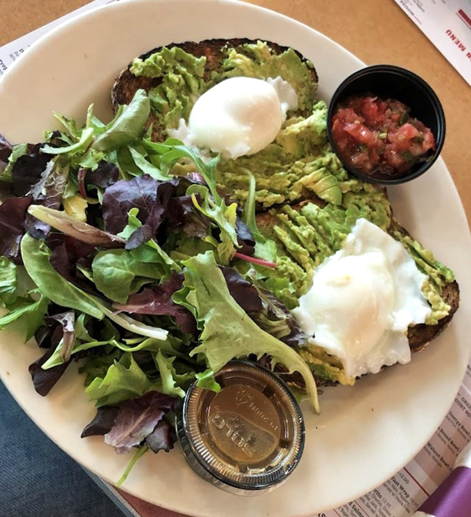 When your avocado toast comes with poached eggs instead of scrambled, it's like the diner saying, "We see you trying to be healthy. Here's a runny yolk reward."