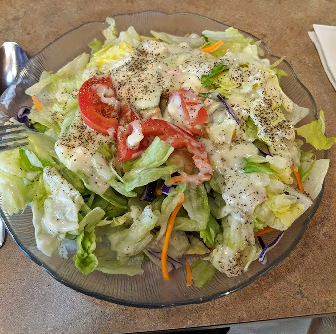 Even the salad looks like it belongs in barbecue paradise. Fresh, crisp, and ready to provide the illusion of virtue between bites of smoky perfection.