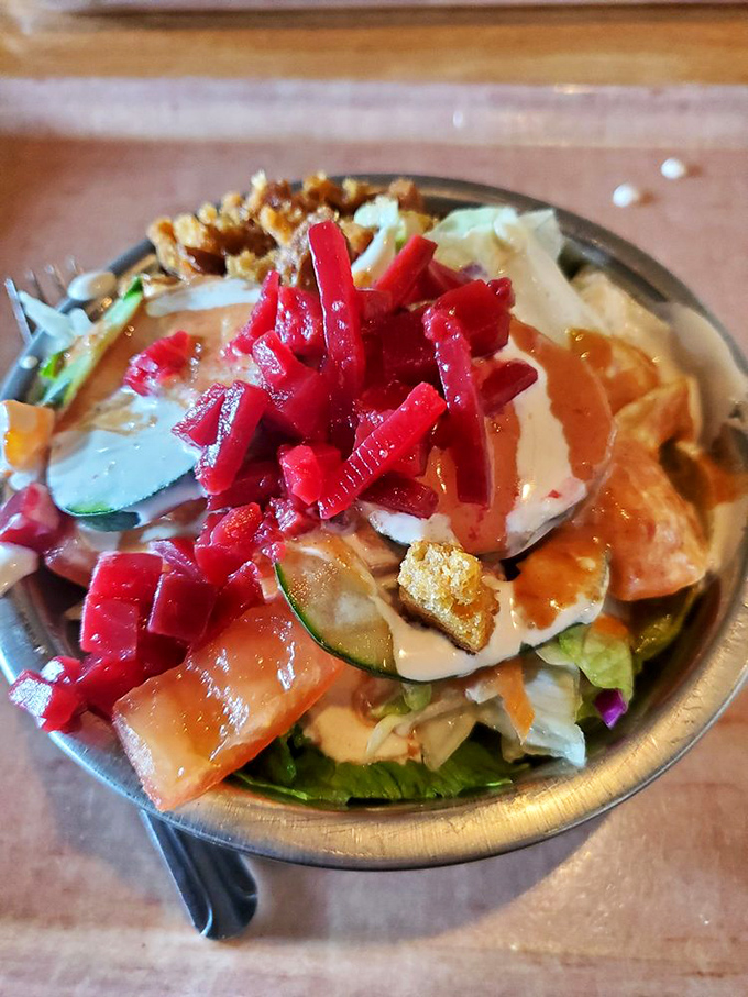 A salad bar creation topped with those signature bright red beet chunks. In the age of $18 "artisanal" salads, this honest bowl feels revolutionary.