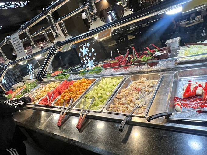 The salad bar exists for those who believe vegetables deserve representation, even at a seafood feast.