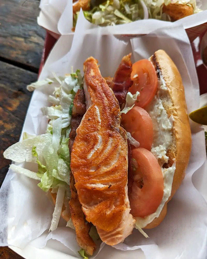 The salmon BLT&mdash;where crispy bacon meets perfectly grilled fish in a sandwich romance worthy of a Nicholas Sparks novel.
