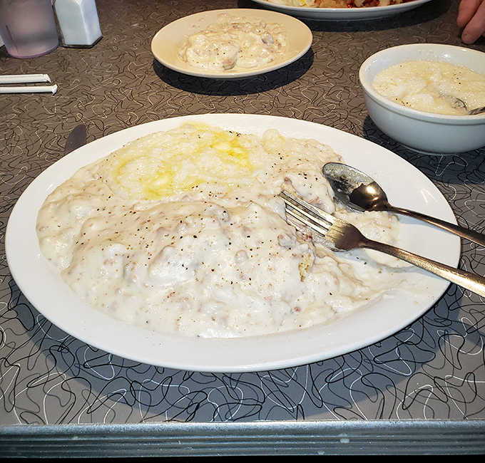 Biscuits and gravy so comforting, it's like wearing your favorite sweatpants while someone else does your taxes for you.