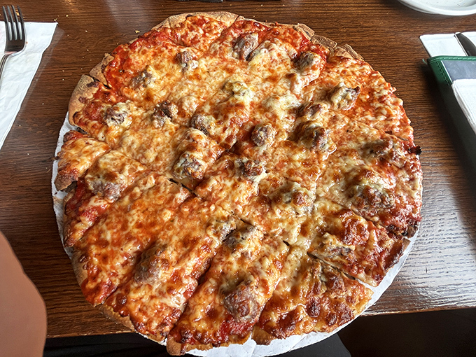 Sausage pizza so good it should have its own fan club. The kind of pie that makes you question why you ever ate anywhere else.
