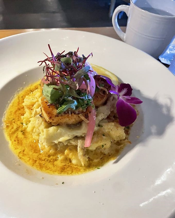 Perfectly seared scallops glisten with caramelized edges that would make Julia Child do a happy dance.