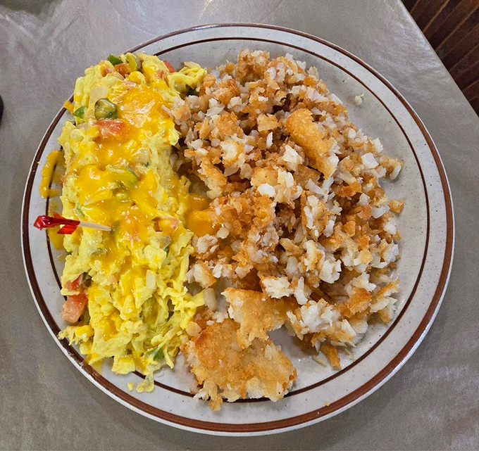This veggie-loaded omelet and crispy hash browns prove that breakfast is the meal most likely to make you cancel lunch plans.