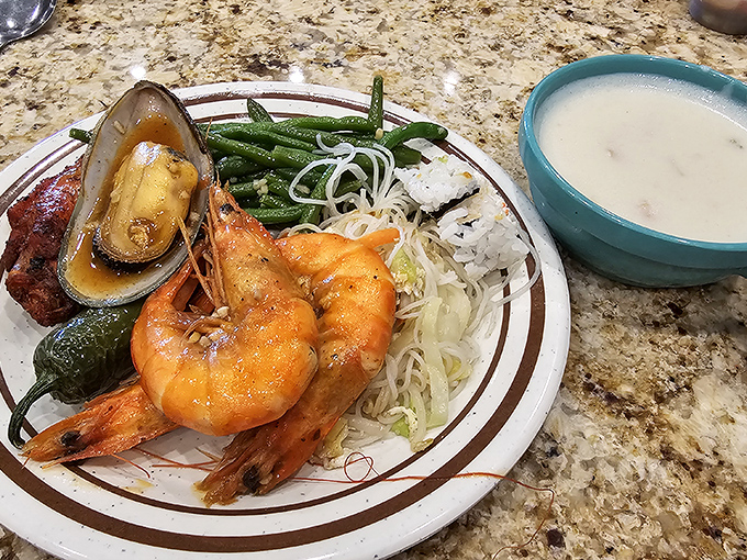 Seafood that doesn't know it's being served at a buffet. Those shrimp look like they just arrived from the ocean instead of the freezer.