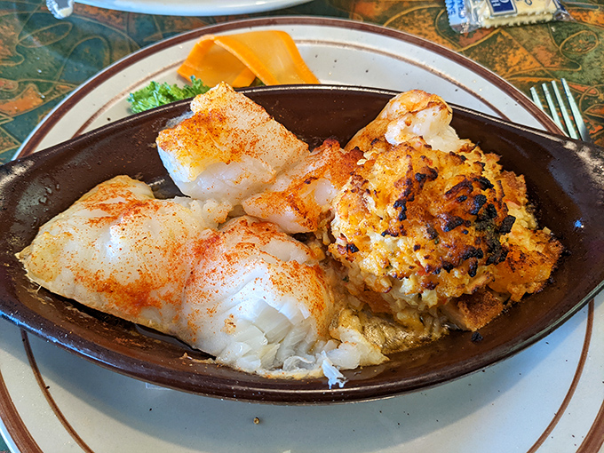 Seafood that traveled from ocean to plate, now swimming in butter instead of the Atlantic.