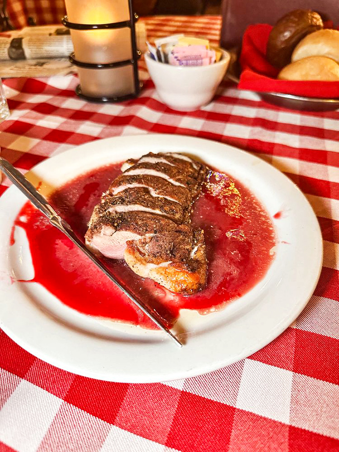 Duck breast swimming in raspberry zinfandel sauce&mdash;where frontier tradition meets culinary sophistication. The lavender rub is pure genius.