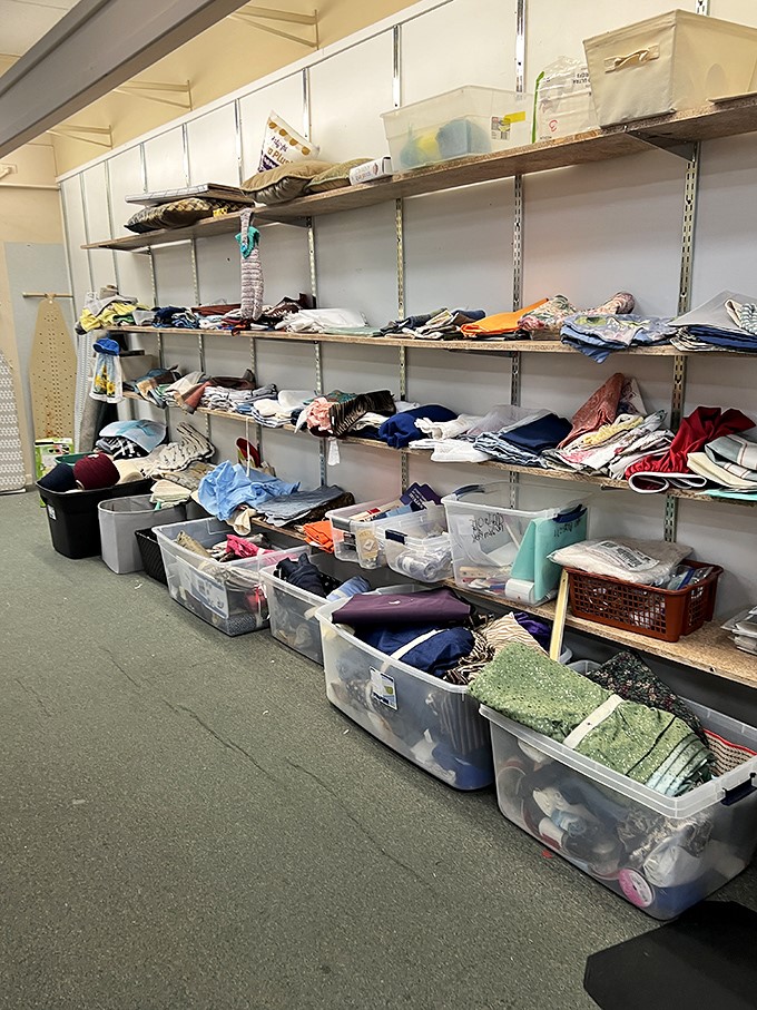Behind the scenes magic&mdash;where donations transform into organized treasure. These plastic bins are like cocoons, waiting for items to emerge as someone's perfect find.