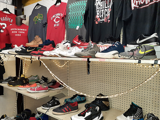 Sneakerheads and sports fans converge at this booth where vintage kicks and team gear create a colorful timeline of athletic fashion.