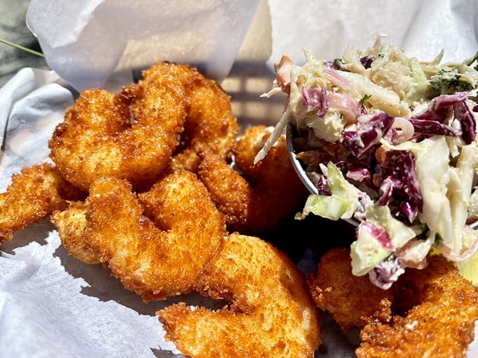 These fried shrimp aren't just crispy – they're audibly crunchy. The coleslaw provides the perfect creamy counterpoint.