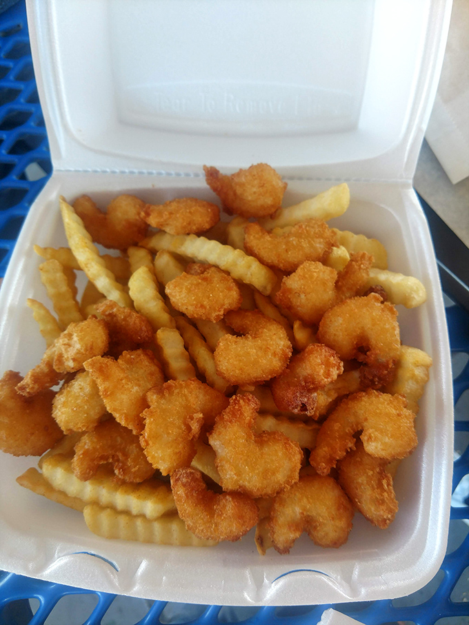 The perfect marriage of crispy and tender &ndash; fried shrimp nestled among golden fries, a combo that's been making Americans happy for generations.
