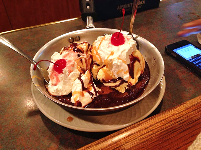 The skillet cookie: where childhood nostalgia meets adult-sized portions. Worth every calorie and the inevitable food coma.