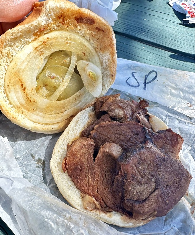 A sandwich that's more meat than bread &ndash; exactly as it should be. Those onions aren't garnish; they're the supporting actors in this meaty drama.
