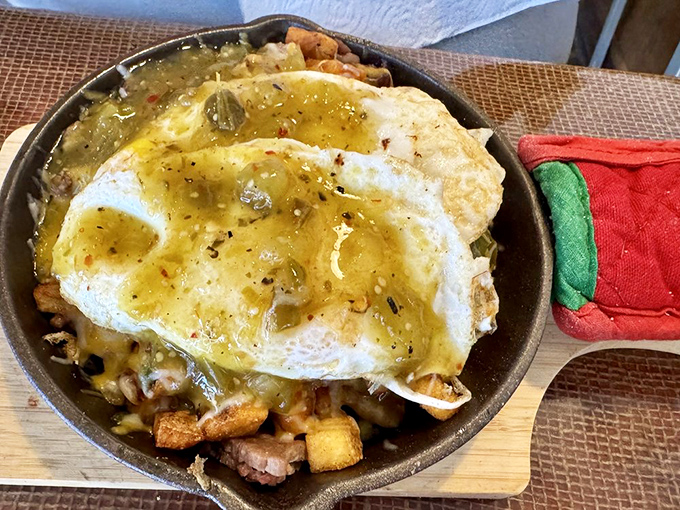 A skillet breakfast that sizzles with personality&mdash;sunny eggs crowning a kingdom of potatoes and meat in their cast iron throne. 