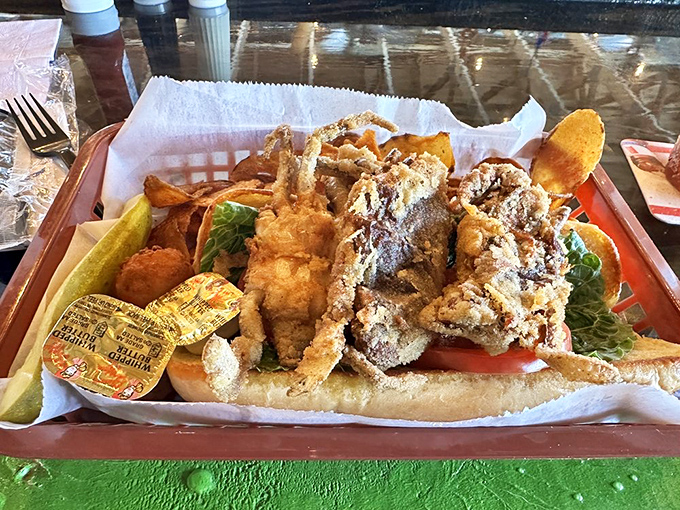 This soft shell crab po' boy is loaded with enough seafood to make you question whether you need both hands or possibly a forklift.