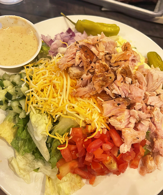 A salad that doesn't apologize for being healthy because it's loaded with enough smoked turkey to satisfy any carnivore's conscience.