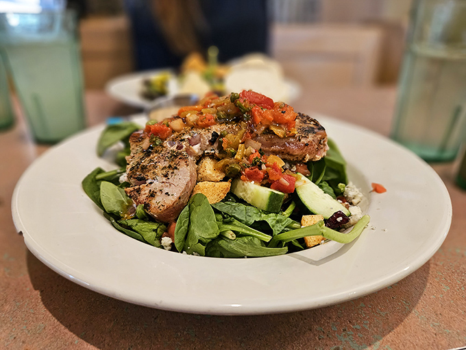 A salad that makes you forget you're eating healthy. That perfectly seared protein atop fresh greens proves Wisconsin knows more than just cheese.