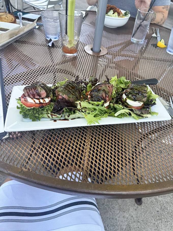 Steak Caprese that bridges the gap between steakhouse and trattoria. Those grill marks aren't just for show&mdash;they're flavor tattoos.