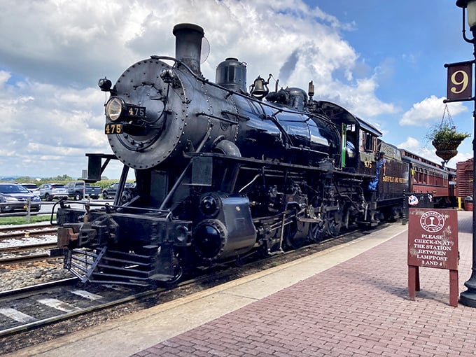 This magnificent steam locomotive stands as a gleaming monument to American ingenuity, ready to transport visitors through Lancaster County's rolling countryside.
