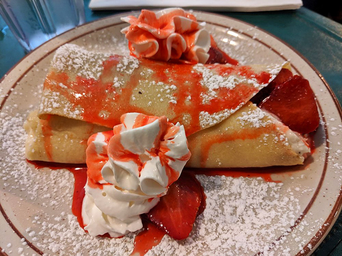 Dessert masquerading as breakfast? These crepes with strawberries and cream make a compelling case for starting your day with something sweet.