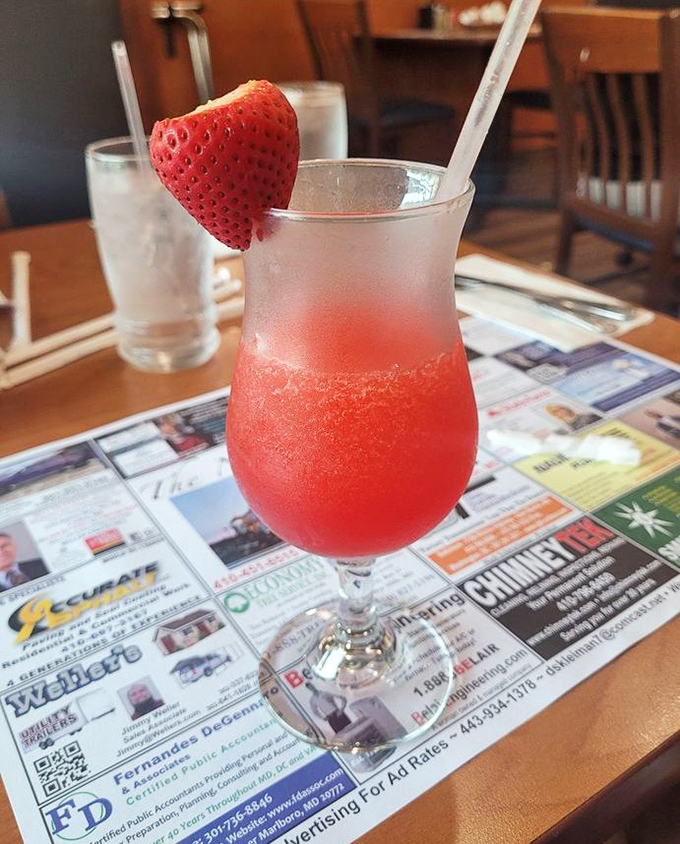 That strawberry daiquiri isn't just a drink, it's a vacation in a glass, complete with a strawberry life preserver on the rim.
