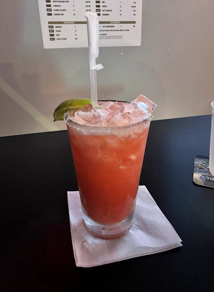This strawberry margarita looks refreshingly dangerous, the kind of drink that makes you forget you have work tomorrow morning.
