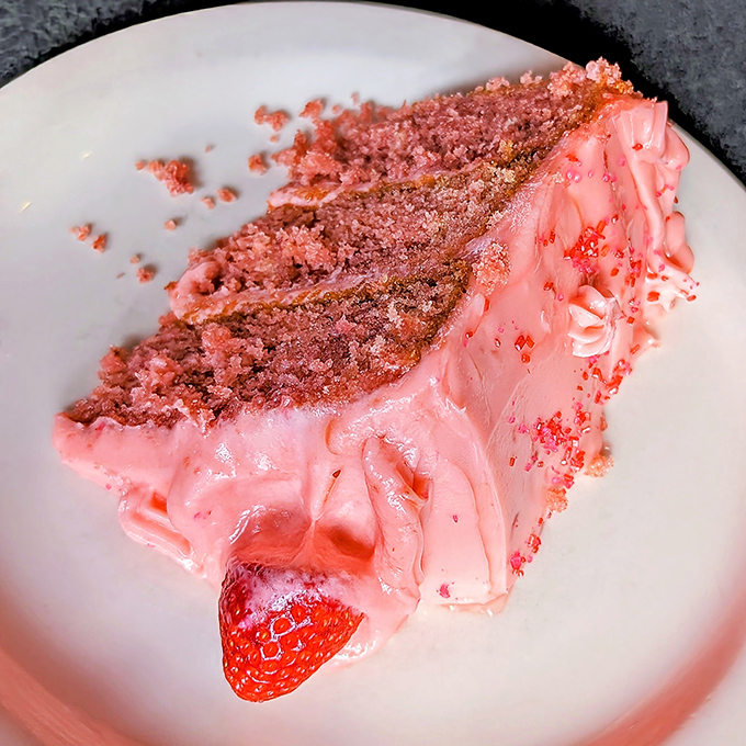A slice of strawberry cake so pretty it belongs in both the dessert case and an art gallery. Yes, cake for breakfast is allowed here.