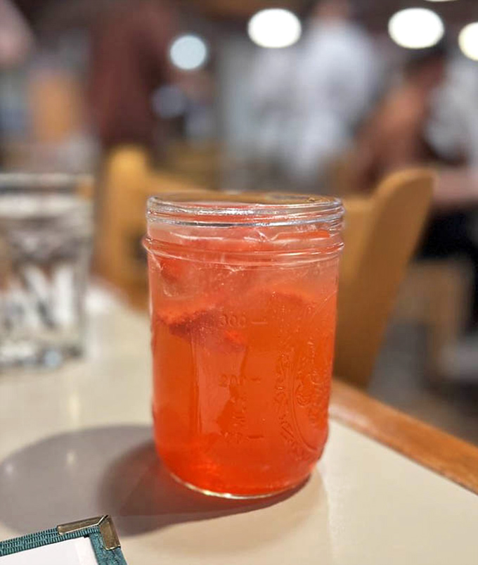 That's not a typo&mdash;it's fresh strawberry drink in a mason jar, because even your beverages deserve to feel like they're at a country fair.