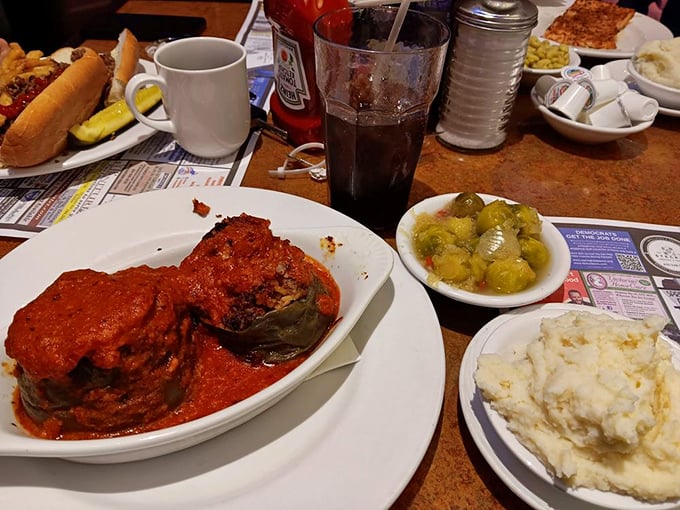 Stuffed peppers that look like they're auditioning for a comfort food calendar&mdash;hearty, saucy, and exactly what your grandmother would make if she had the time.