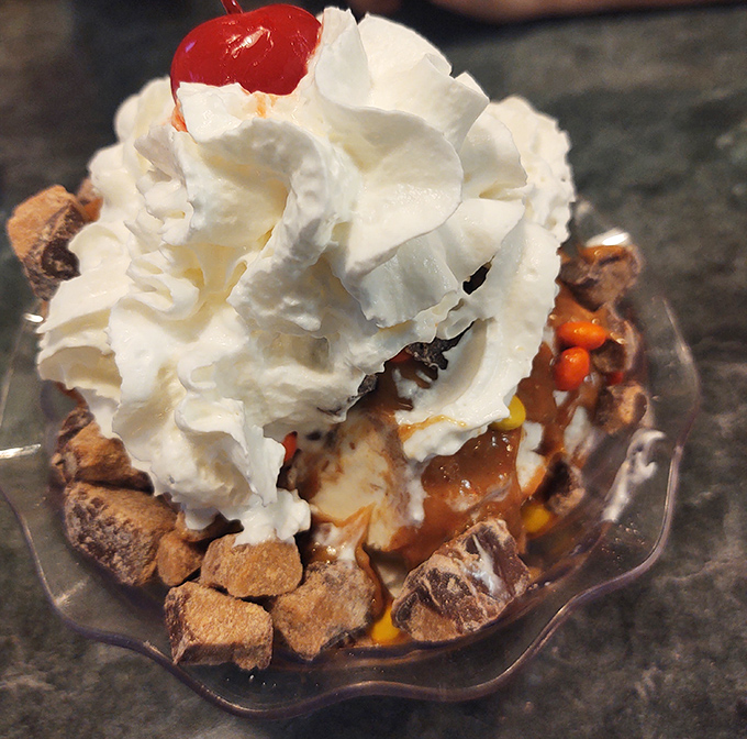 Ice cream sundaes should always wear whipped cream hats and cherry berets. This one's dressed for the occasion.