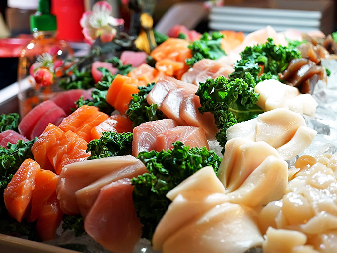 The sushi bar stretches endlessly with fresh rolls lined up like colorful soldiers ready for your dining pleasure.