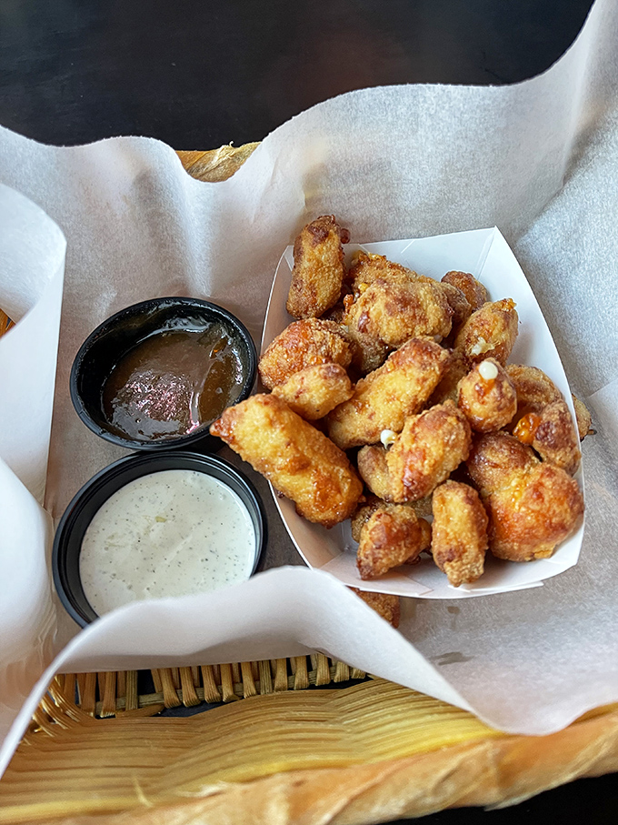 Not your cafeteria lady's tater tots. These golden-brown beauties have graduated with honors from the school of comfort food.