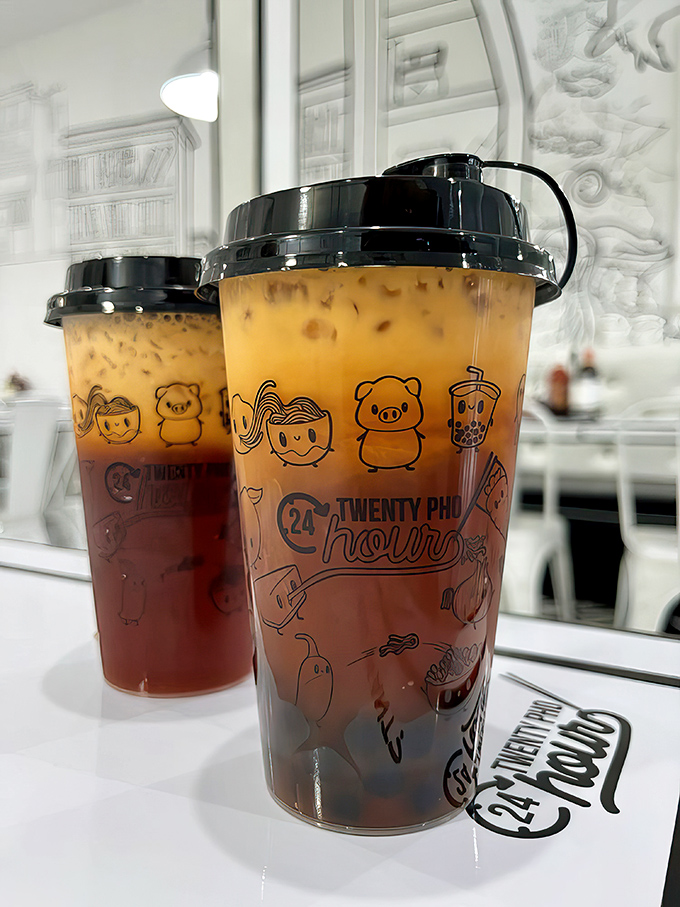 Thai tea in custom cups&mdash;where the layers aren't just for show. The perfect sweet counterpoint to spicy dishes.