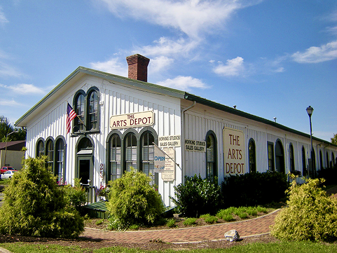 The Arts Depot transformed a former train station into a creative haven. White clapboard and arched windows frame a space where local artists keep Appalachian traditions alive.