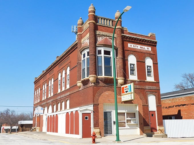 City Hall stands proud in its brick splendor, a municipal building with the architectural flair of a much pricier zip code.