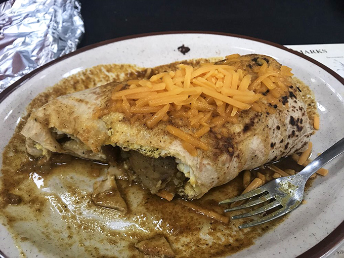 This cheese-draped creation swimming in savory sauce looks like it could cure whatever ails you. Fork required, diet optional.