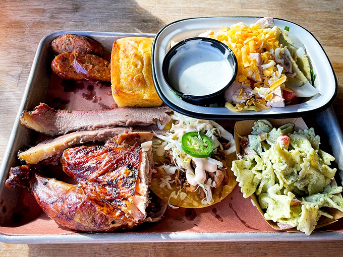 A BBQ sampler that answers the eternal question: "Why choose one meat when you can have them all?" Pure protein poetry.