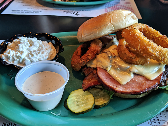 This isn't just a sandwich &ndash; it's an engineering marvel with onion rings that deserve their own architectural award.