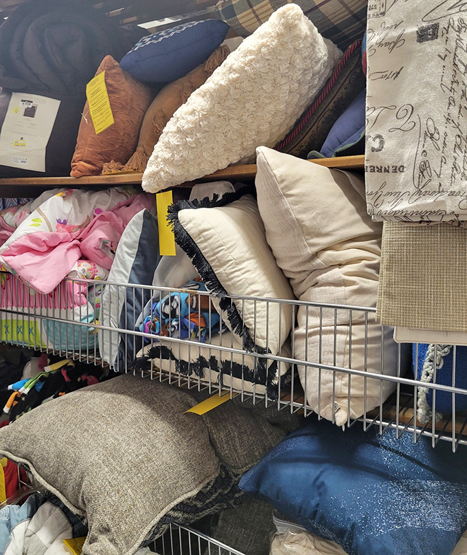 Pillow mountain! Somewhere in this textile terrain is the perfect accent for your couch, just waiting to be discovered and brought home.