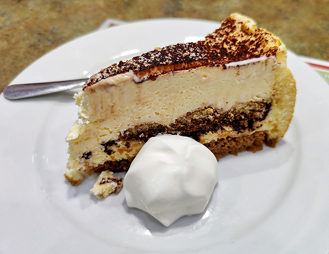 Tiramisu that makes you wonder why you ever waste calories on lesser desserts. Coffee-soaked perfection with a side of "just one more bite."