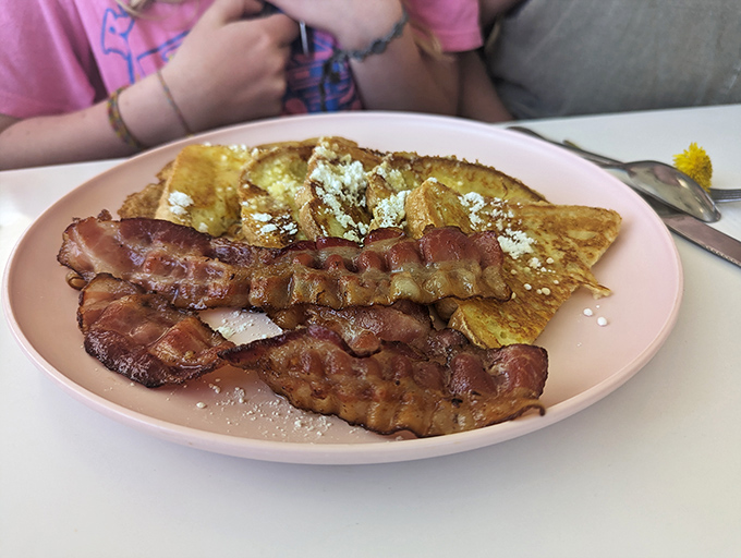 Golden French toast and bacon that would make even your cardiologist pause before delivering the usual lecture.
