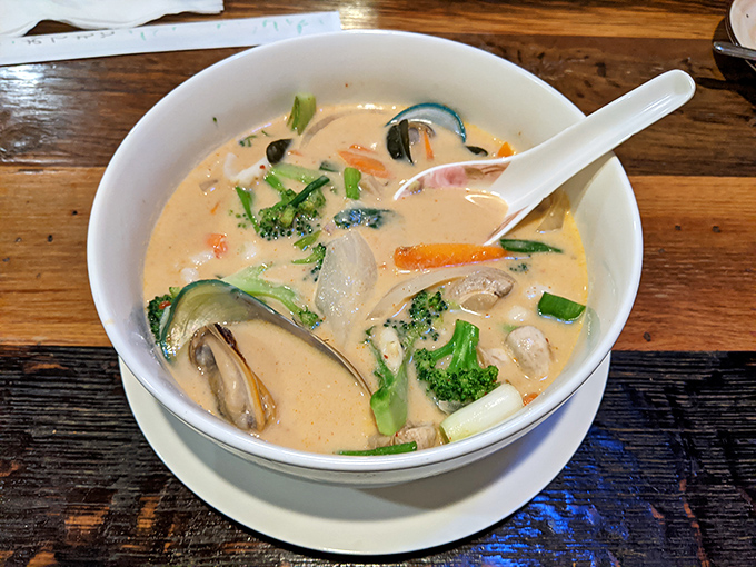 Tom Kha soup&mdash;where coconut milk meets vegetables in a steamy love affair that warms you from the inside out.