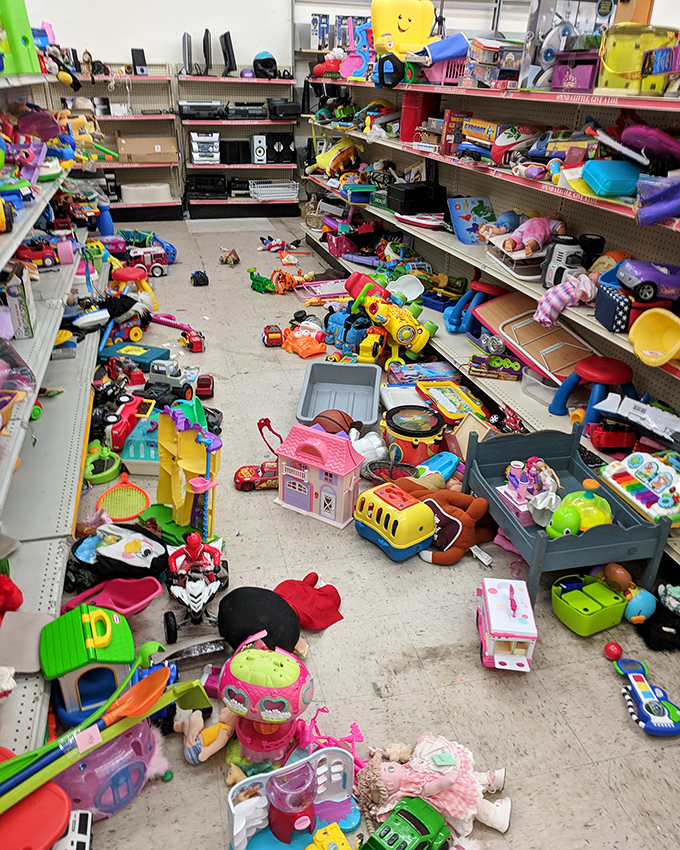 Organized chaos in the toy section—a nostalgic wonderland where childhood memories are priced by the pound and slightly sticky to the touch.